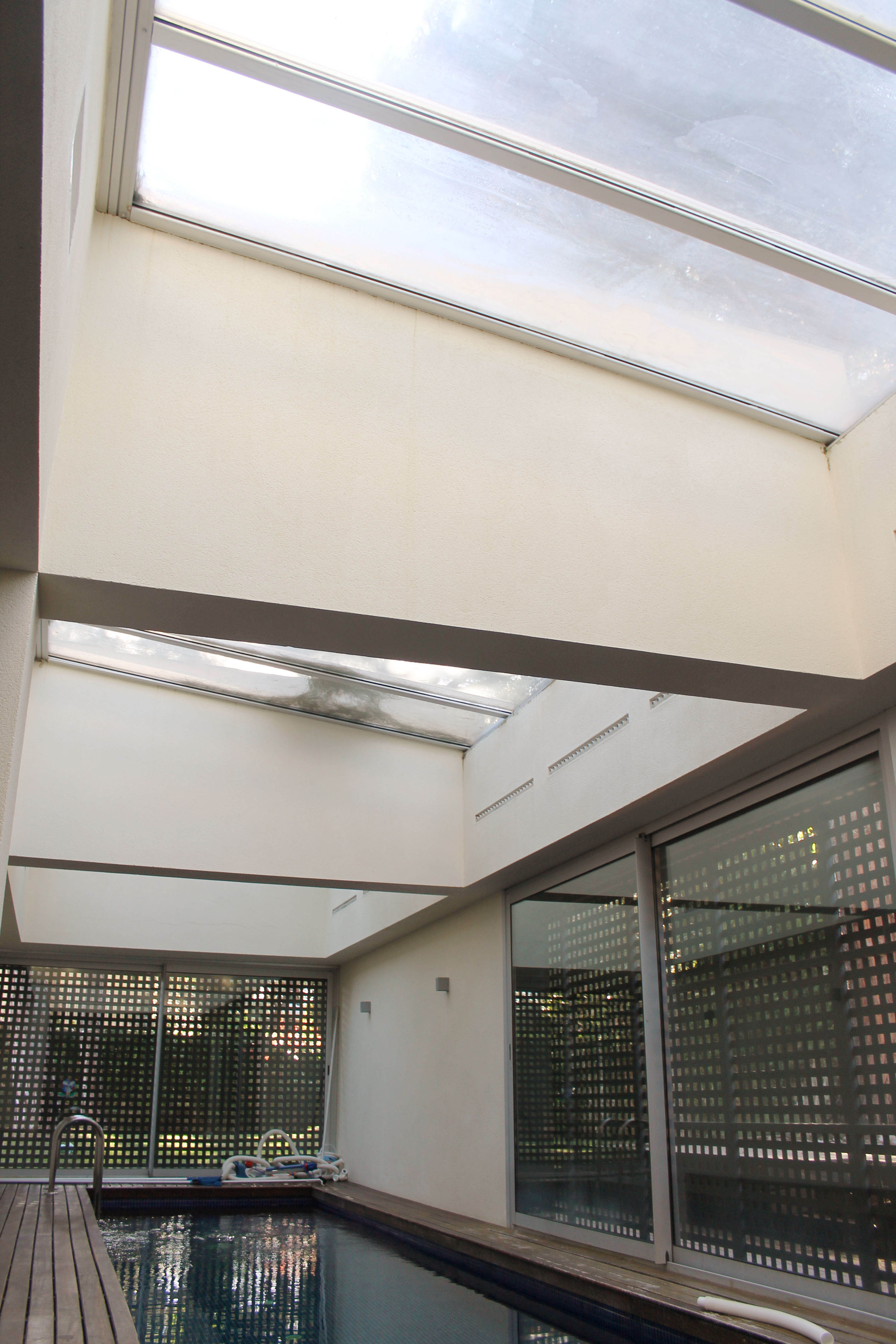 Perforated shutters protecting glazed pool [368] | filt3rs